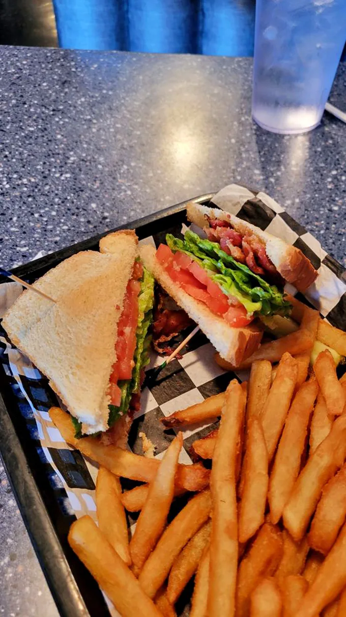 The club sandwich: a timeless classic that's out of this world. Stacked higher than a Saturn V rocket and just as powerful!