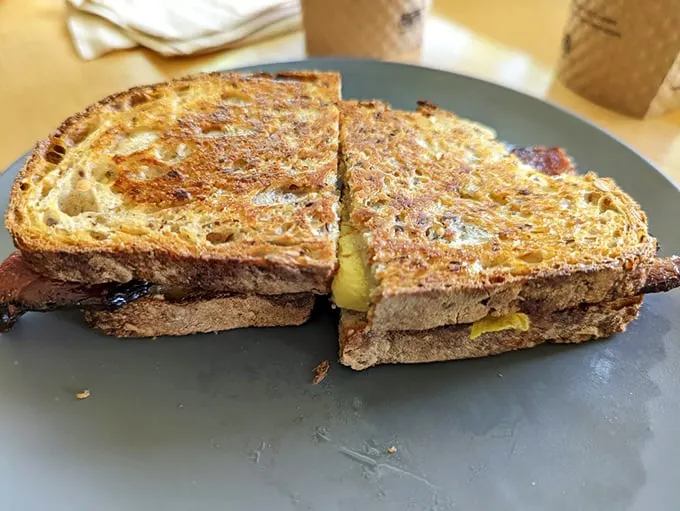 The breakfast sandwich that puts your sad desk lunch to shame! Layers of goodness nestled between perfectly toasted slices of heaven.