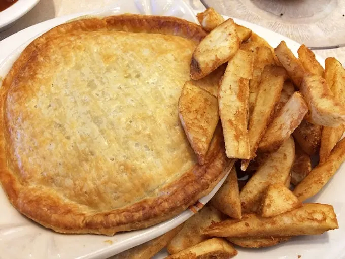 Is it a pie? Is it a spaceship? No, it's Dysart's chicken pot pie! This golden-crusted beauty could make even your grandma jealous.