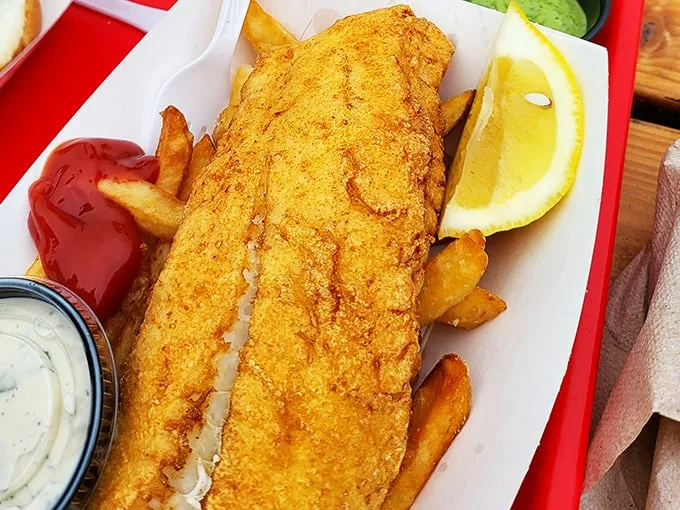 Golden-fried perfection meets the sea. This fish and chips could make a Brit weep with joy.