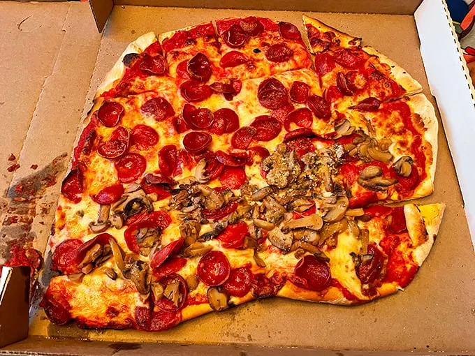 Half pepperoni, half mushroom, all delicious. This pizza doesn't just bridge toppings; it bridges generations of pizza lovers.