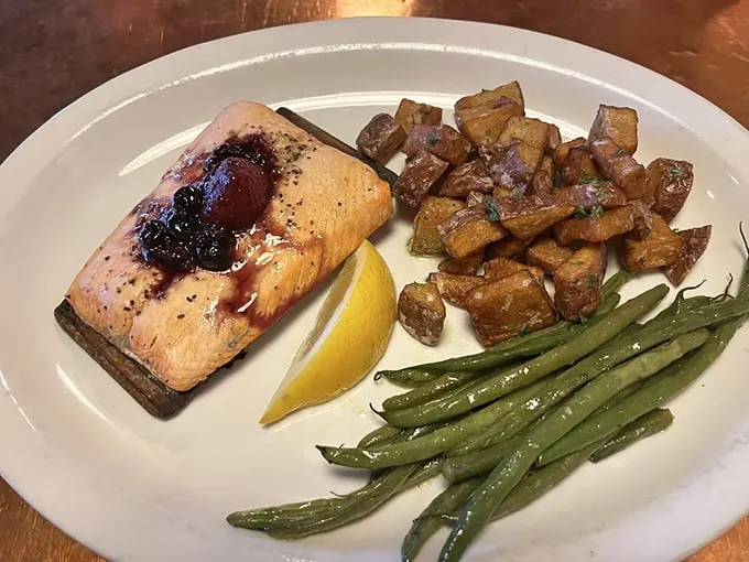 Swimming upstream to flavor town! This salmon dish is a symphony of colors and textures that would make any grizzly bear jealous.