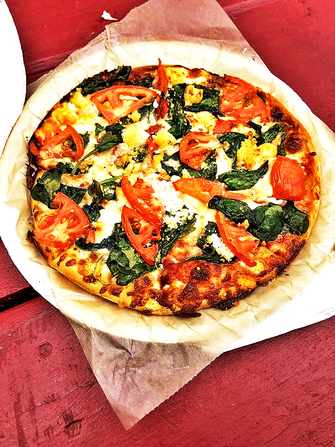 "Bert's Special: A flavor explosion that'll make your taste buds do a happy dance!" This loaded pizza is proof that sometimes, more really is more. 