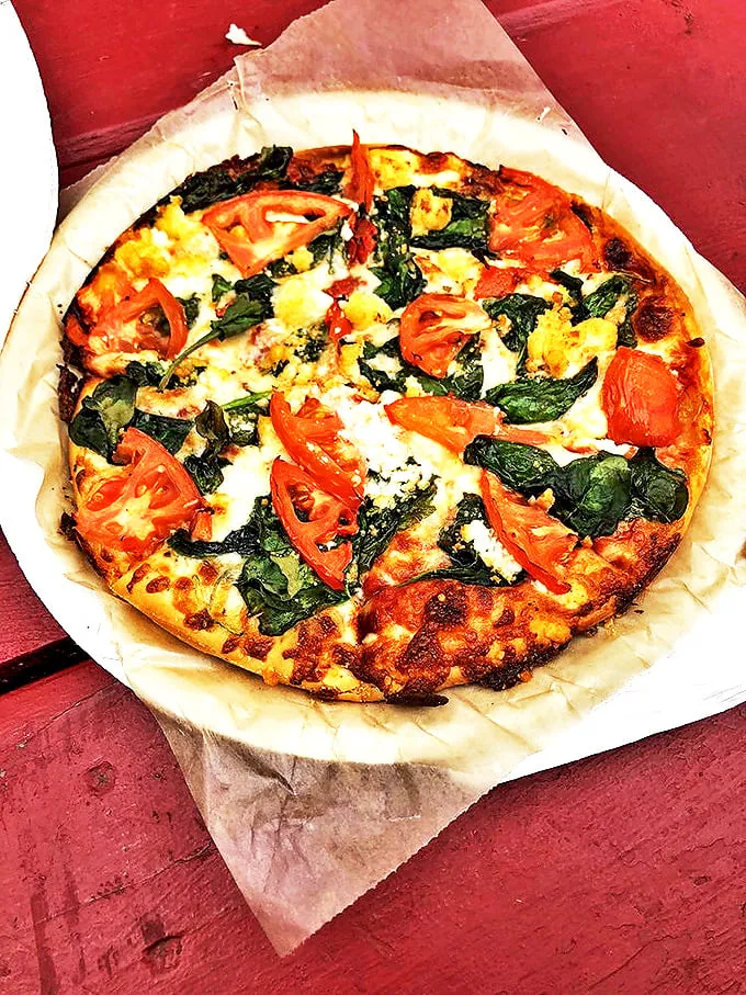 "Bert's Special: A flavor explosion that'll make your taste buds do a happy dance!" This loaded pizza is proof that sometimes, more really is more.