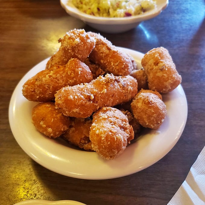 Corn fritter nirvana! These golden nuggets of joy are like edible sunshine – crispy, sweet, and utterly addictive.