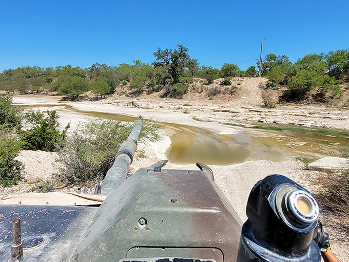 "Tank-top weather in tank country!" The rugged Texas landscape provides the perfect backdrop for some heavy metal fun.