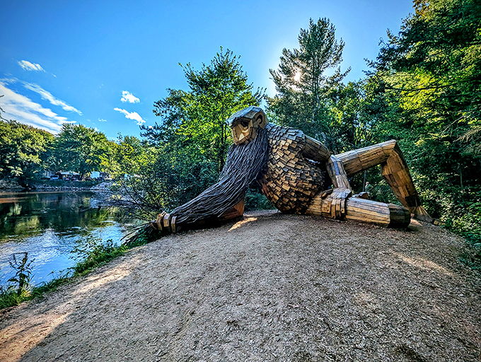 Troll meets world! Benny's front-row seat to nature's beauty puts your living room recliner to shame. Talk about a room with a view!