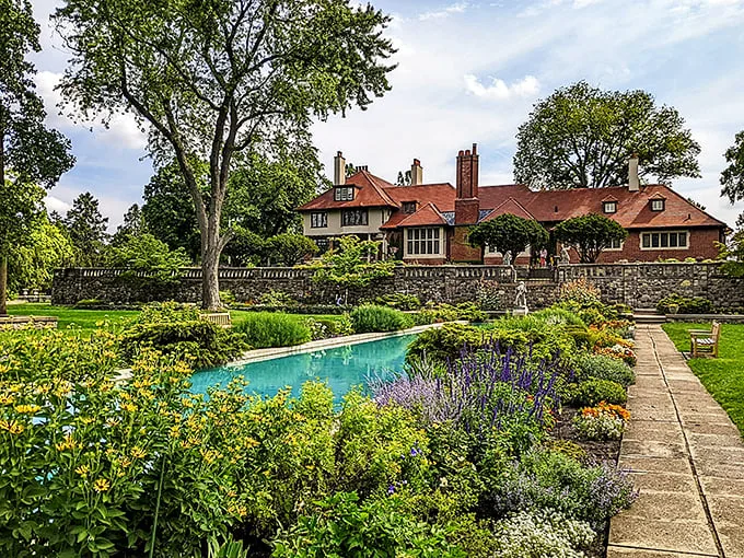 Cranbrook House: Where English gardens meet Midwest charm. It's like Downton Abbey's cool American cousin decided to throw a garden party.