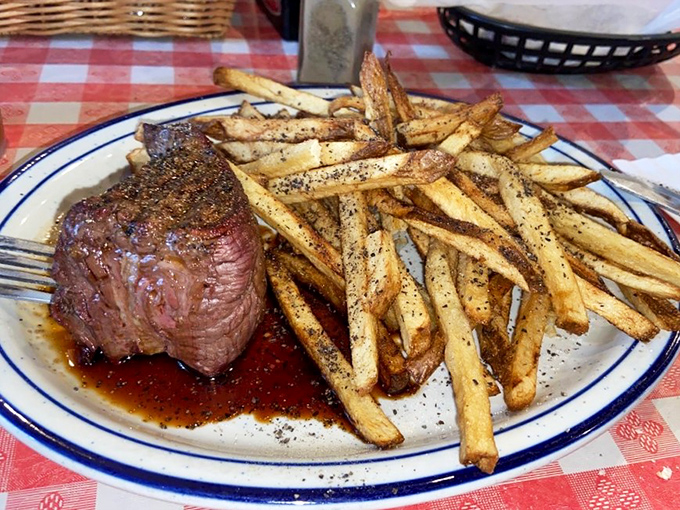 Steak frites, Doe's style. These crispy, seasoned fries are the Robin to your steak's Batman – a perfect sidekick to the main attraction.
