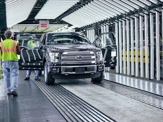 Detroit's mechanical ballet: Watch as raw metal transforms into road-ready chariots, proving that American ingenuity is still revving strong.
