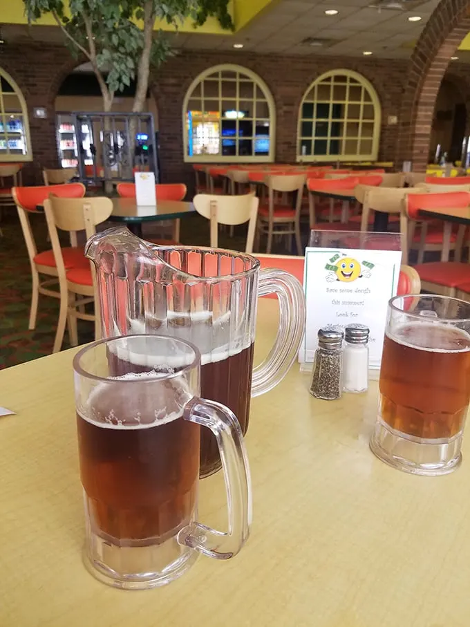 Cheers to good times! These frosty mugs of beer are the perfect sidekick to Marion's pizza – a dynamic duo of deliciousness.