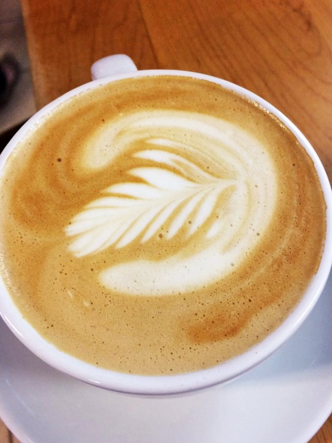 Latte art so pretty, you almost don't want to drink it… almost. This leafy design is like a caffeinated Rorschach test for coffee lovers.