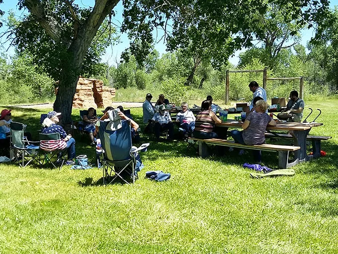"Picnic perfection! These folks have mastered the art of outdoor dining – no reservations required, just good company and great views."