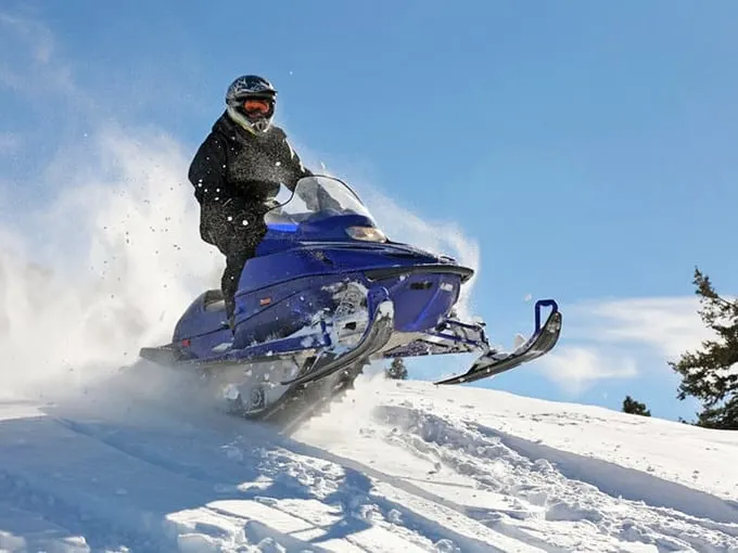 Snowmobiling thrills: Zoom through Petoskey's winter wonderland faster than Santa on Christmas Eve. Who needs reindeer when you've got horsepower?