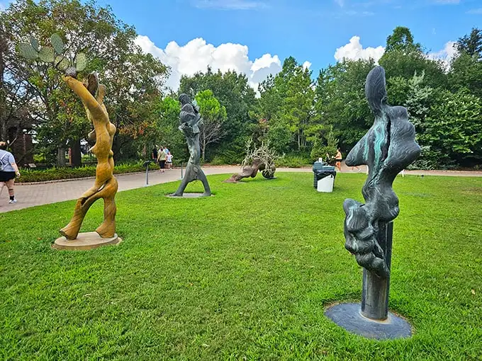 Modern art meets nature with these towering sculptures—where elegant lines and bold shapes create a striking contrast against the greenery. It’s like the garden was designed to make you stop, look, and think.