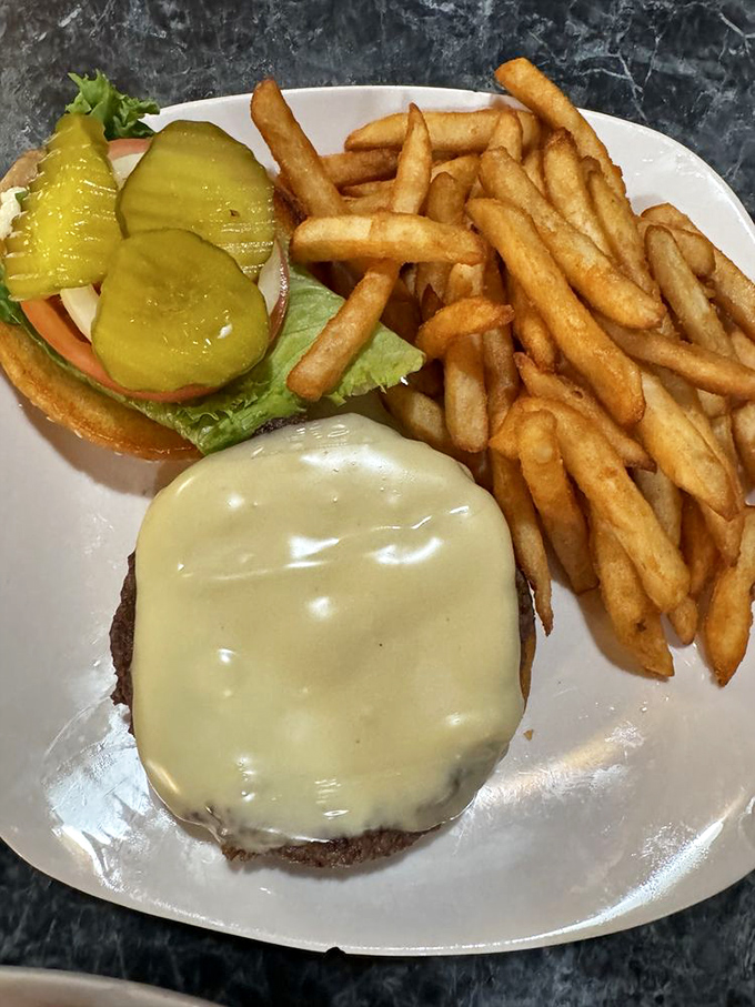 The classic cheeseburger gets a golden sidekick. These crispy fries are the Tonto to your burger's Lone Ranger – a perfect partnership.