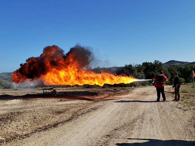 "Who ordered their steak well-done?" A massive fireball erupts, demonstrating the raw power of military-grade flamethrowers.