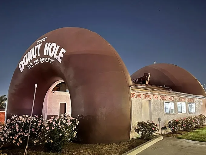 As night falls, the Donut Hole transforms into a beacon of hope for late-night sugar seekers. Sweet dreams are made of these.