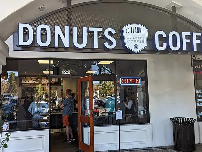 Welcome to donut nirvana! JD Flannel's storefront promises a world of sweet delights, beckoning you like a siren's call to carb-lovers everywhere.