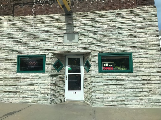 A time capsule of taste! Olsen Bake Shop's unassuming exterior hides a world of sugary wonders, proving that the best things in life don't need fancy packaging.