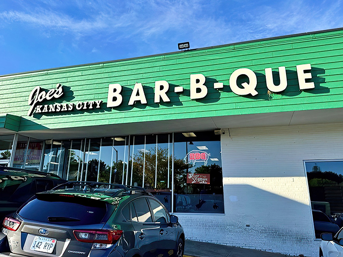 The legendary gas station BBQ joint that proves great food doesn't need fancy real estate—just smoke, patience, and a line of devoted fans.