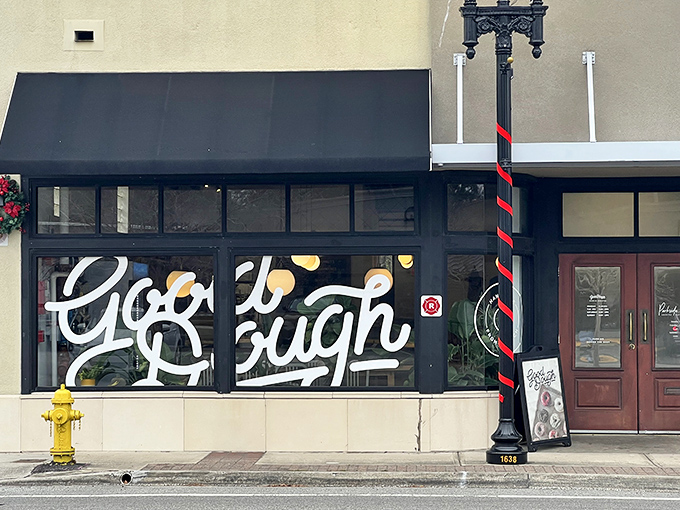 The storefront of Good Dough beckons like a siren song, with elegant script promising circular delights within. Florida's hidden gem awaits discovery.
