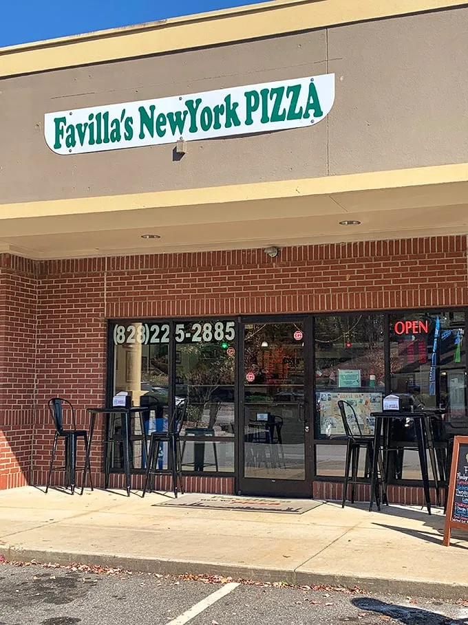 A slice of the Big Apple in Asheville! Favilla's neon sign beckons pizza lovers like a lighthouse guiding hungry sailors home.
