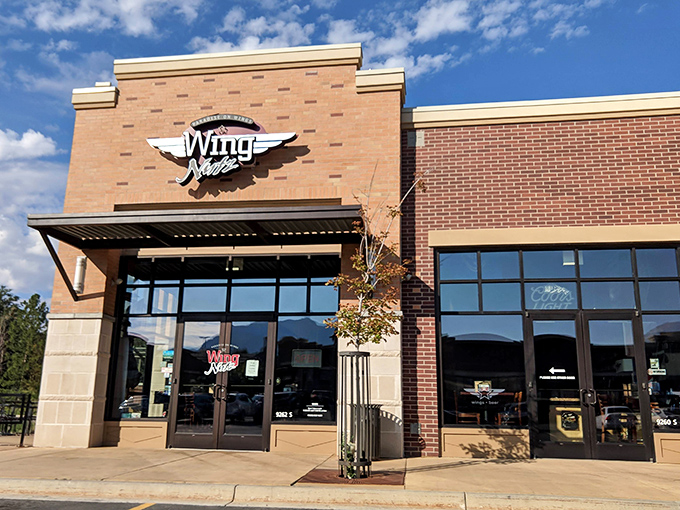 The unassuming brick facade of Wing Nutz in Sandy hides culinary treasures within—like finding a Picasso at a yard sale.