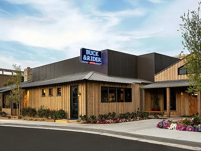 A coastal oasis in the desert! Buck & Rider's rustic-chic exterior beckons seafood lovers with the promise of oceanic delights and cozy charm.