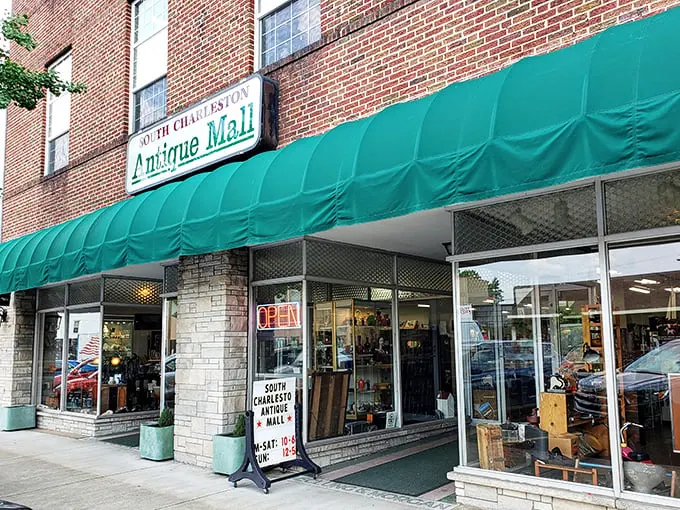 A brick-and-mortar time machine! This unassuming facade holds more stories than your grandma's photo album – and probably just as many doilies.