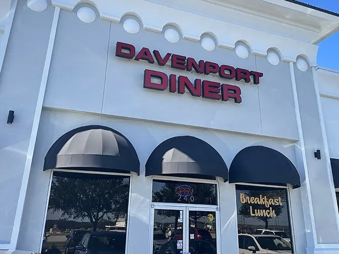 Welcome to flavor town! The Davenport Diner's exterior promises a feast for the senses, with its inviting awnings and cheerful signage beckoning hungry travelers.