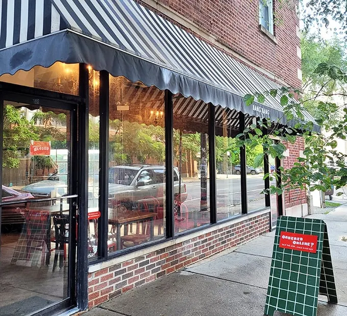 Welcome to pie paradise! Bang Bang's storefront is like a siren call to carb-lovers, with its striped awning and promise of buttery bliss.
