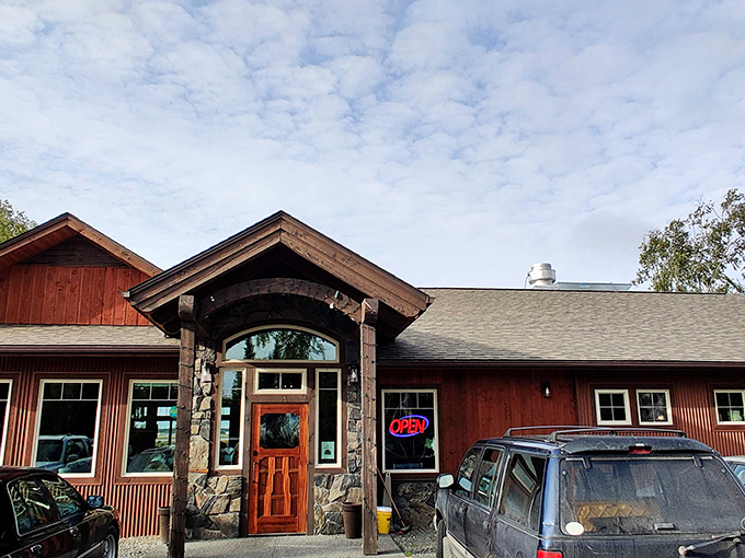 The rustic charm of The Flats Bistro's exterior feels like a warm Alaskan hug – part mountain lodge, part culinary hideaway, all inviting.