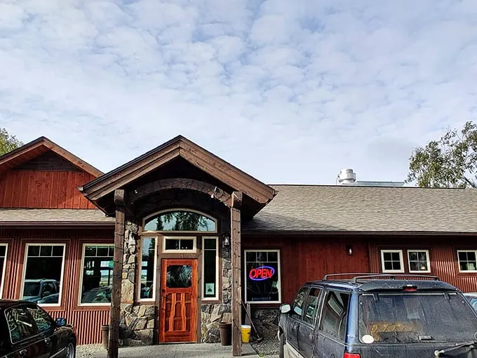 The rustic charm of The Flats Bistro's exterior feels like a warm Alaskan hug – part mountain lodge, part culinary hideaway, all inviting.