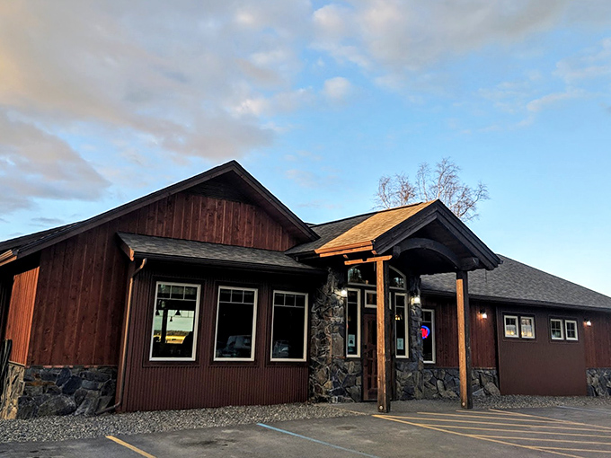 The rustic charm of The Flats Bistro's exterior feels like a warm Alaskan hug – part mountain lodge, part culinary hideaway, all inviting.