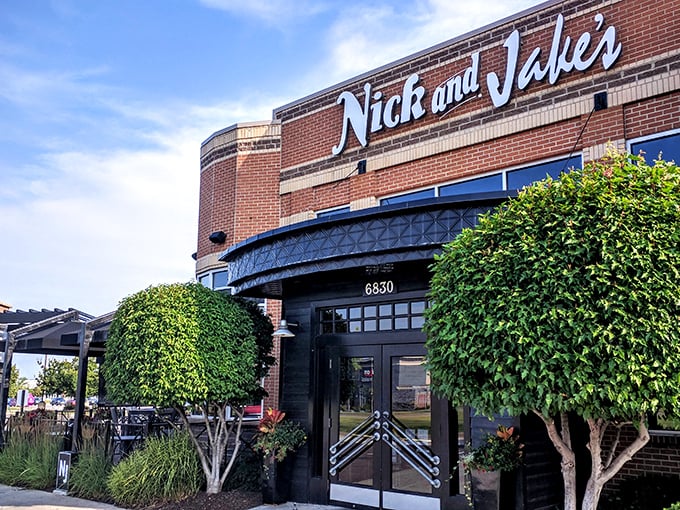 The brick exterior of Nick & Jake's promises comfort within – like that friend whose house always smells like something amazing is baking.