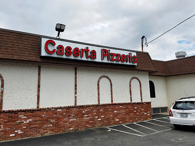 A slice of heaven on Spruce Street! Caserta Pizzeria's unassuming exterior hides a world of flavor within, like a culinary TARDIS for pizza lovers.