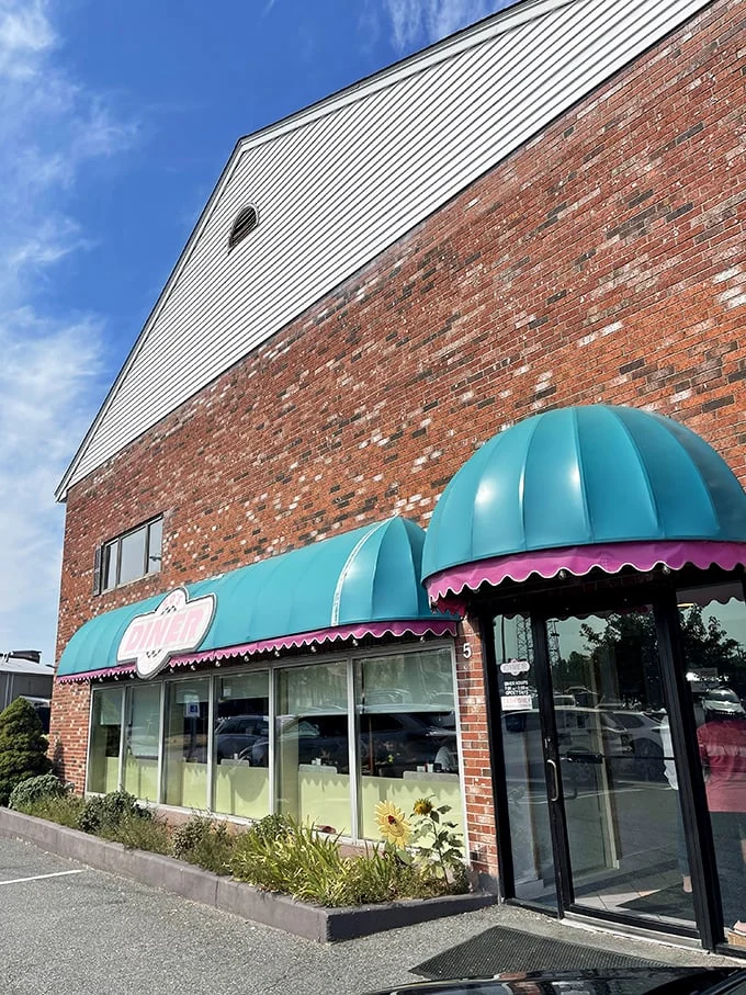 Welcome to the 50's Diner, where nostalgia comes with a side of teal awnings and brick-wall charm. This time capsule of culinary delight is ready to transport you back to the era of sock hops and soda fountains.