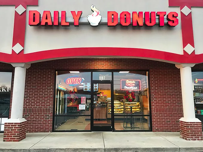 Welcome to donut paradise! Daily Donuts' cheery red sign promises a sugar-coated adventure that'll make your taste buds do a happy dance.