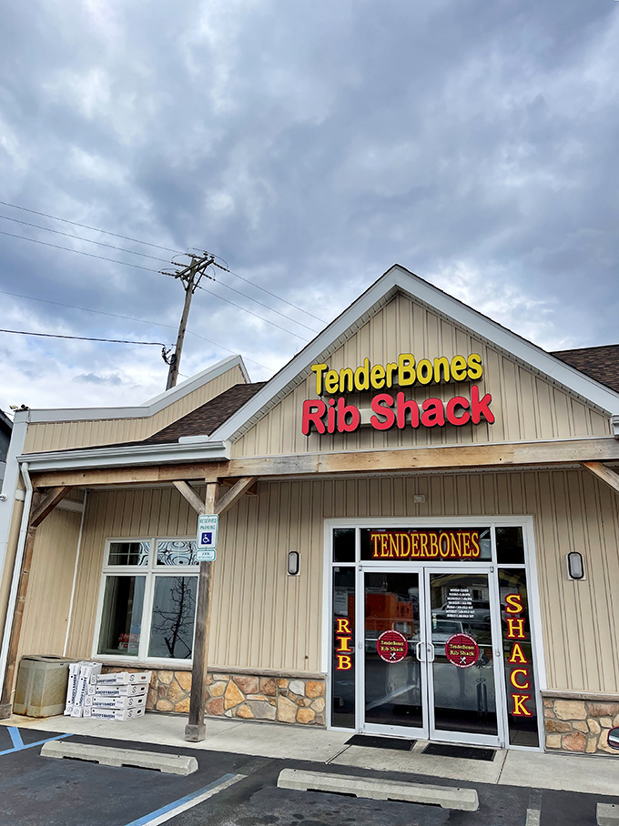Welcome to flavor town! TenderBones Rib Shack's unassuming exterior hides a world of smoky delights, like a barbecue speakeasy for your taste buds.