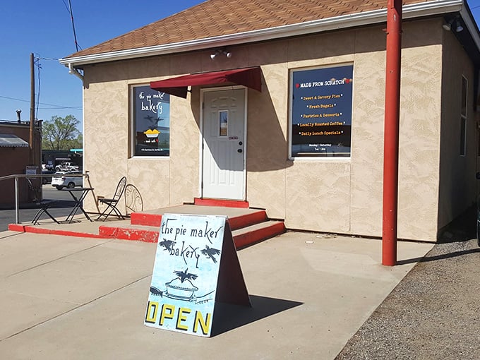 Welcome to pie paradise! The Pie Maker Bakery's charming exterior promises a world of flaky, fruity delights waiting just beyond that red-trimmed door.