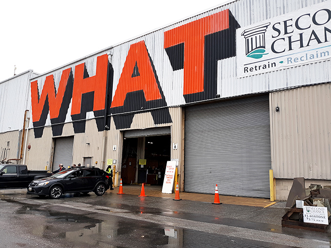 "WHAT" indeed! This industrial facade isn't just asking questions; it's shouting answers about the treasures within.