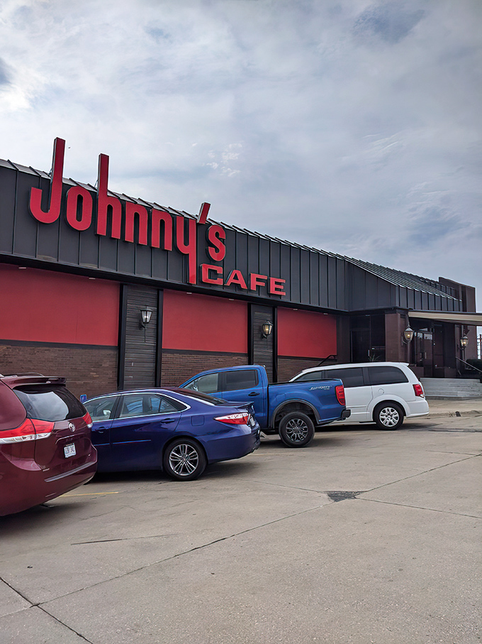 A neon beacon in the night, Johnny's Cafe stands ready to satisfy your carnivorous cravings. This isn't just dinner; it's a pilgrimage for prime rib devotees.