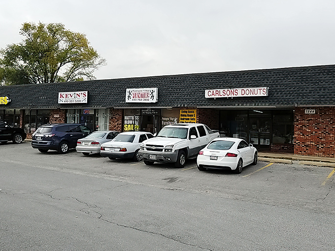 Welcome to donut paradise! Carlson's unassuming exterior hides a world of sugary wonders, proving you should never judge a book by its cover – or a donut shop by its bricks.