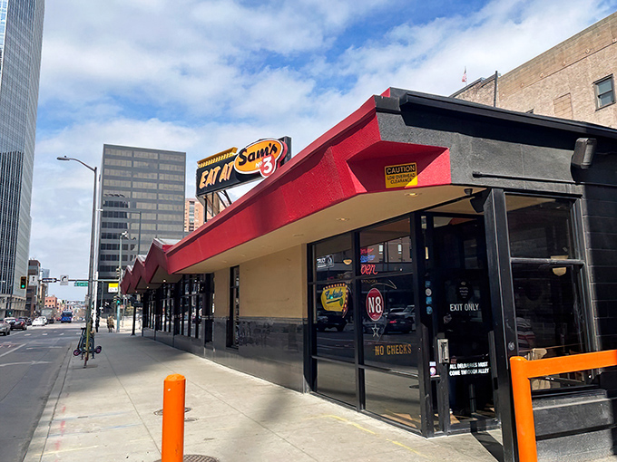 A beacon of culinary delight! Sam's No. 3 stands proud, its red awning a siren call to hungry souls seeking breakfast nirvana.