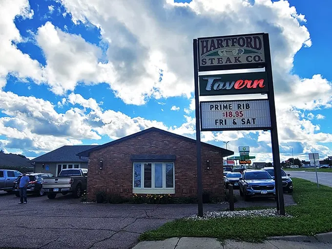"Cold Beer" and hot steaks? Hartford Steak Co. Tavern's exterior promises a carnivore's paradise that's refreshingly unpretentious. It's like finding a treasure chest disguised as a garden shed.