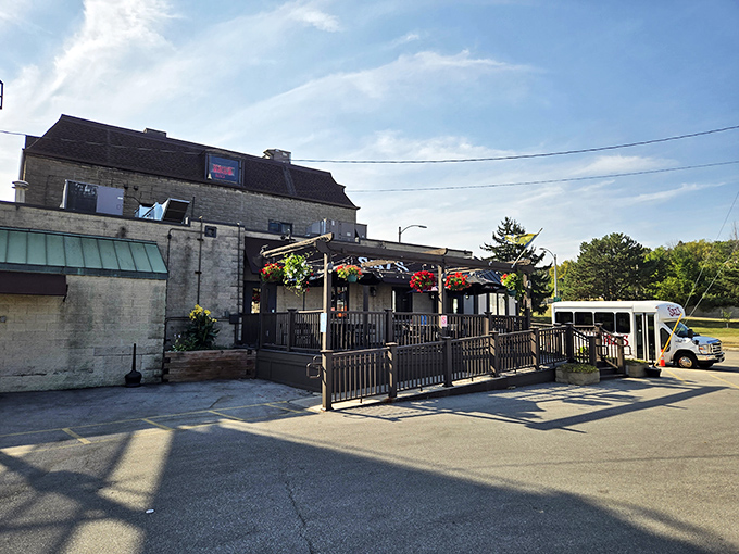 The unassuming stone fortress of flavor stands proudly on State Street, its patio beckoning with colorful hanging baskets—Milwaukee's worst-kept culinary secret.