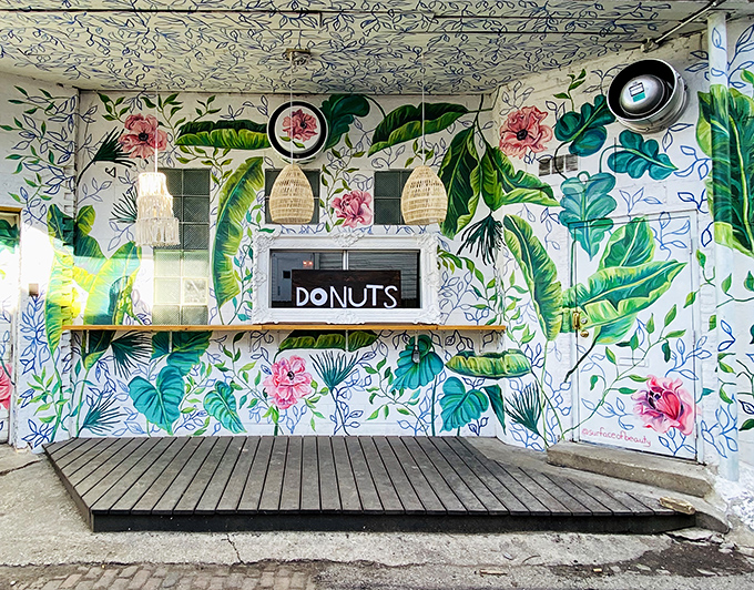 Psychedelic paradise or donut shop? At Beacon Doughnuts, it's a delicious case of "why not both?" This mural could make Willy Wonka jealous.