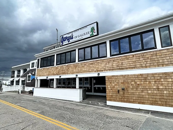 A seafood lover's paradise awaits! George's of Galilee stands proud against the Rhode Island sky, promising oceanic delights and views that'll make your Instagram followers green with envy.
