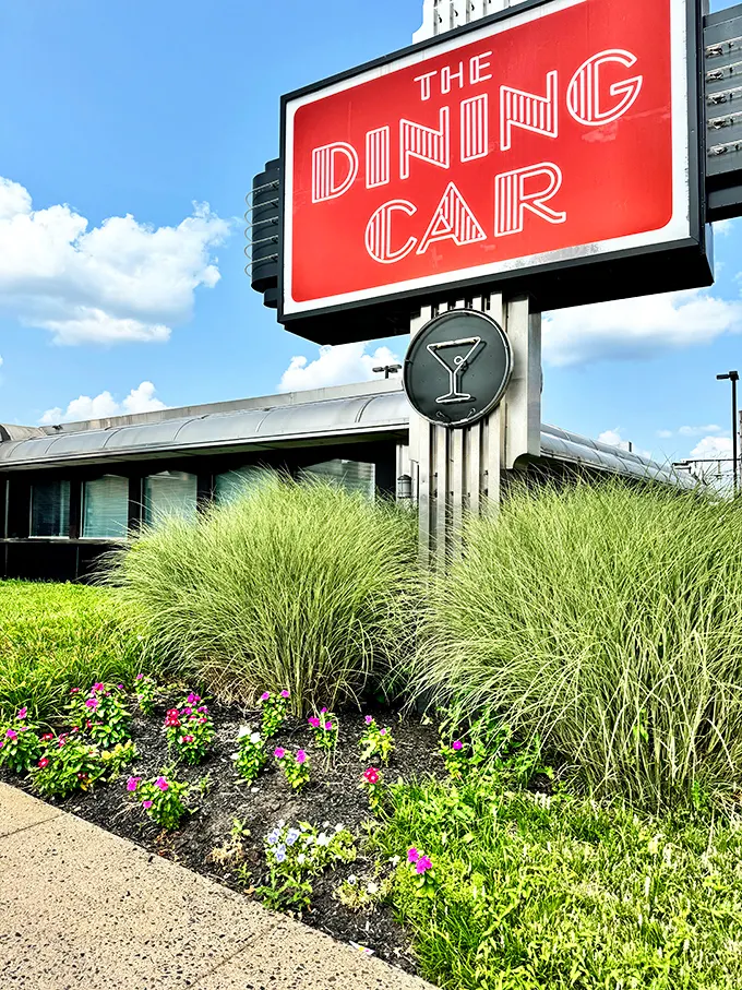 The gleaming Art Deco exterior of The Dining Car stands as a shining beacon of classic Americana, promising comfort food and nostalgia in equal measure.